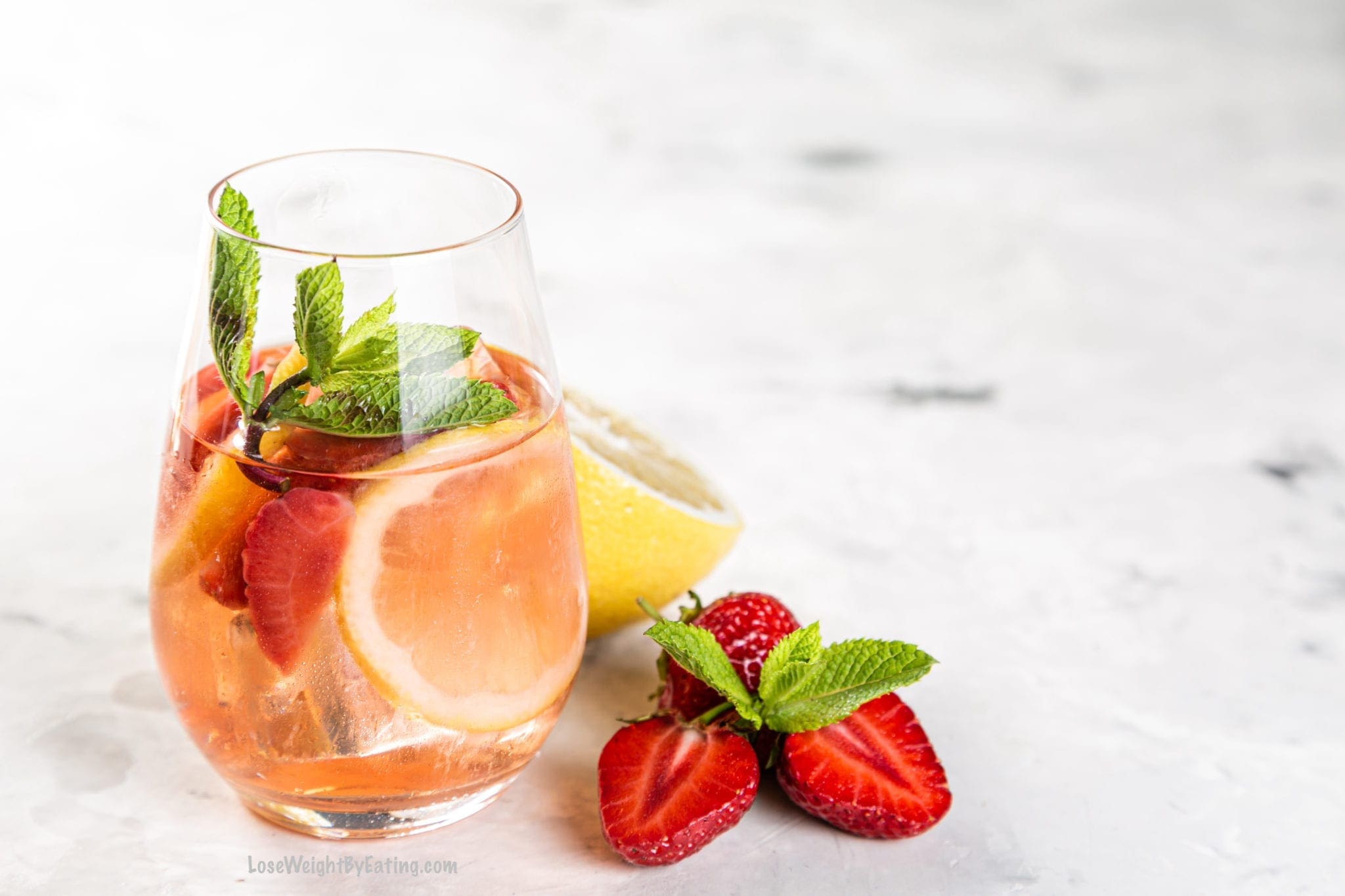 Lemon Strawberry Rosé Sangria Recipe {LOW CALORIE}